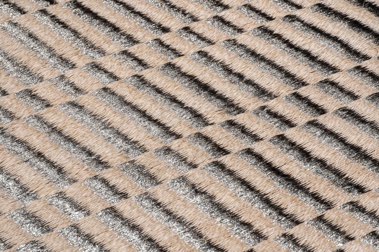 A New Multi-Piece Rug by Verdi Slithers Through the Room - Interior Design