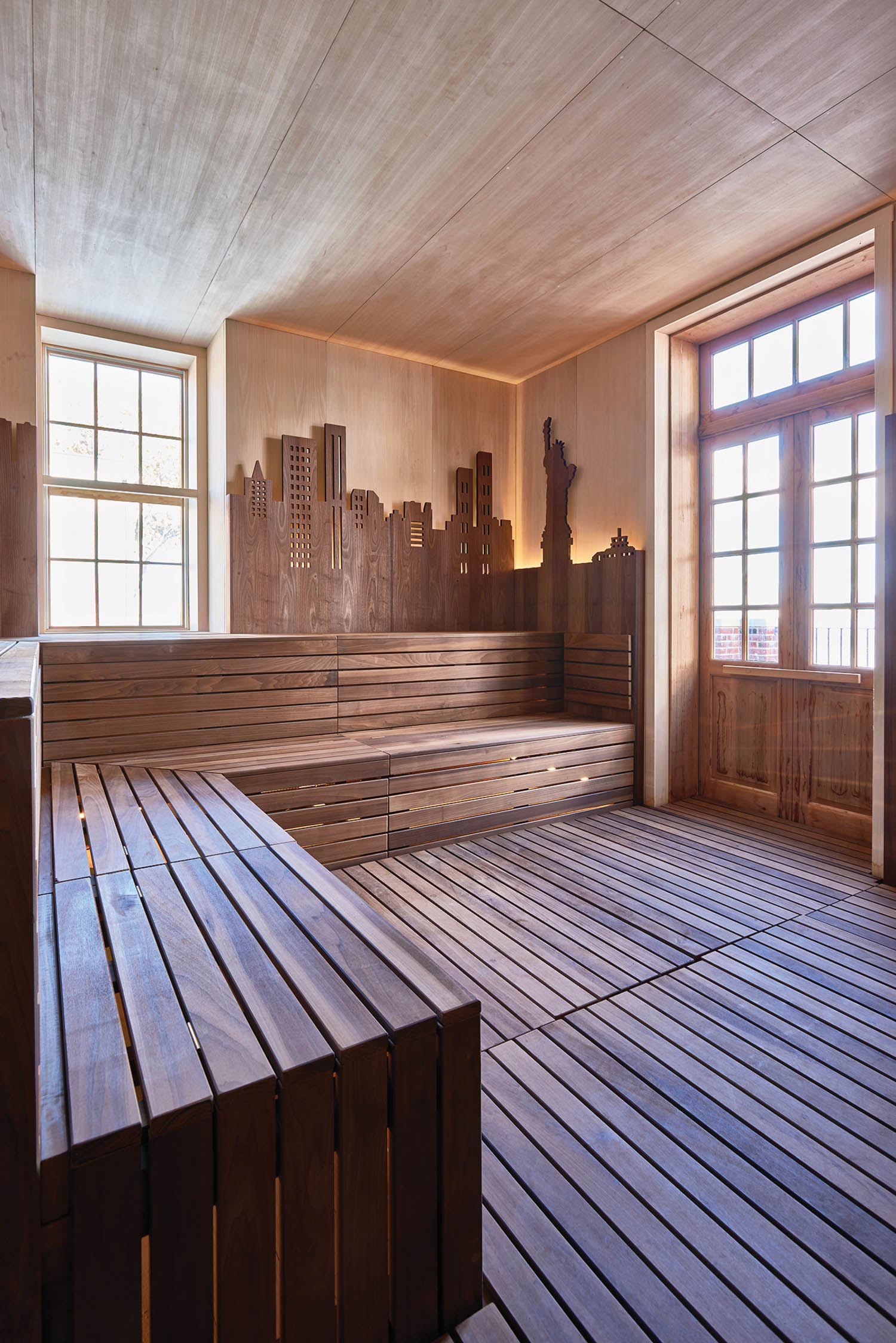 This Waterfront Spa Offers Heated Outdoor Pools and Skyline Views ...