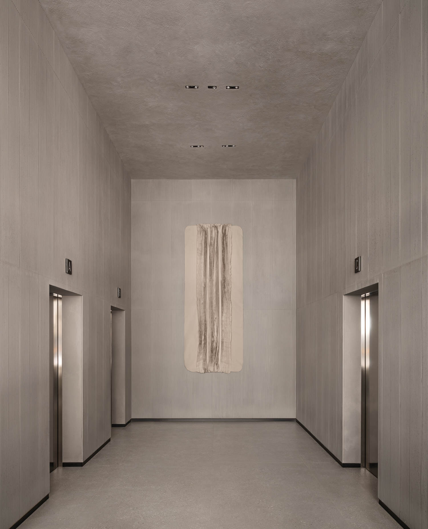 A Kyiv Tech Incubator With a Sleek Yet Earthy Entrance Hall