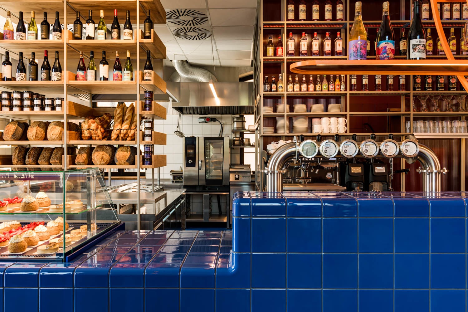 Bold Hues Set the Stage for This Bakery by Day, Club by Night